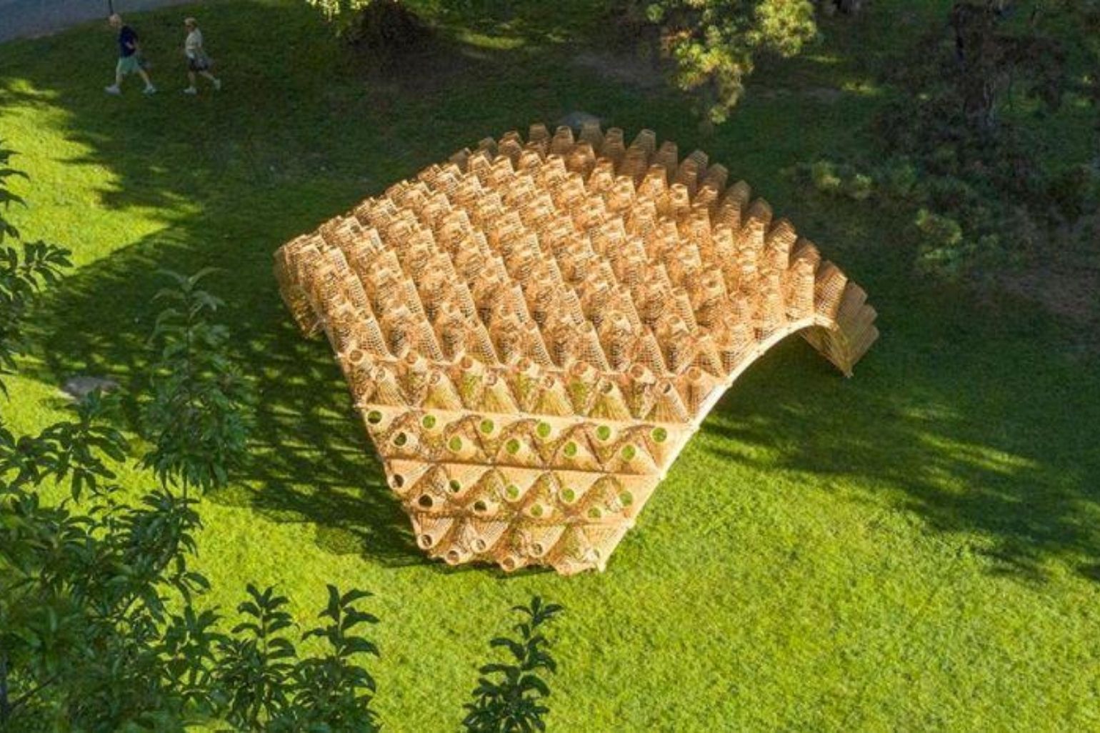 DJA introduces triangular wicker mesh pavilion in france, weaved by ...