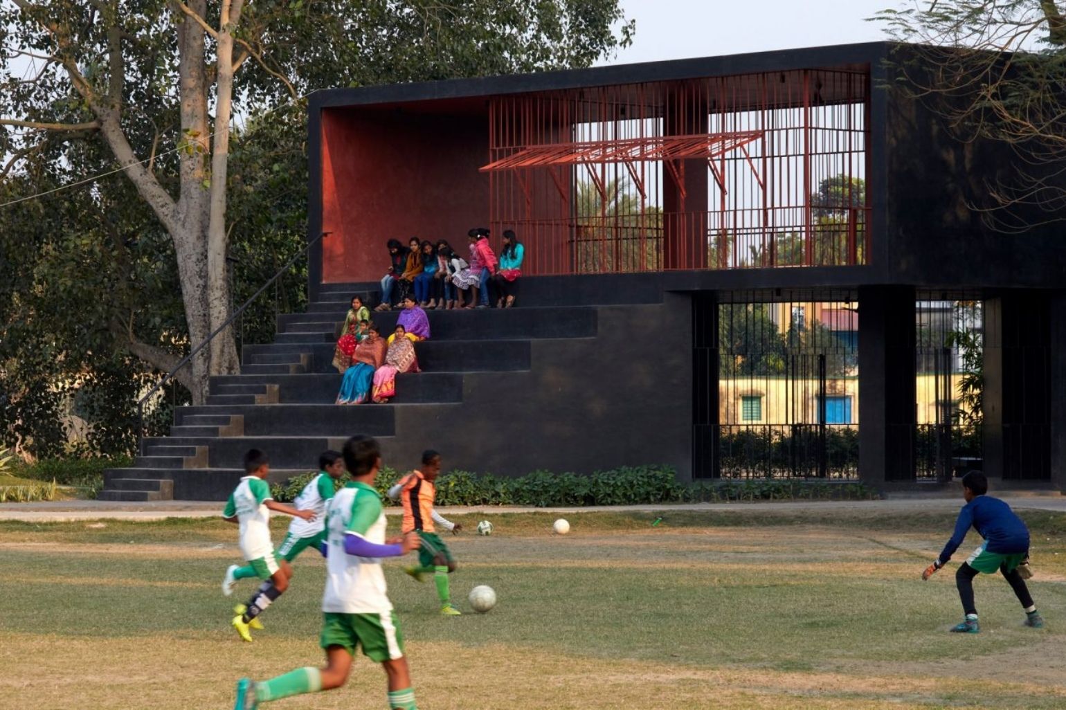 Abin Design Studio creates football clubhouse overlooking Indian lake ...